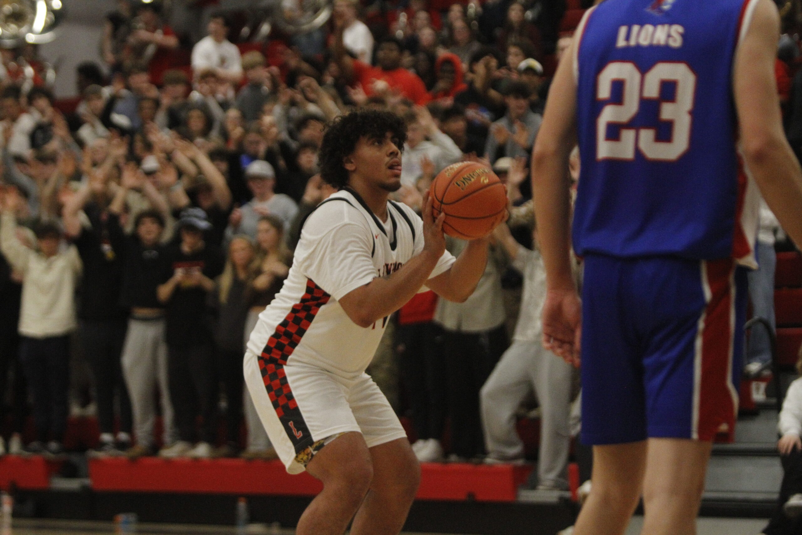 Photo Gallery: Lawrence’s boys and girls basketball teams win by double ...